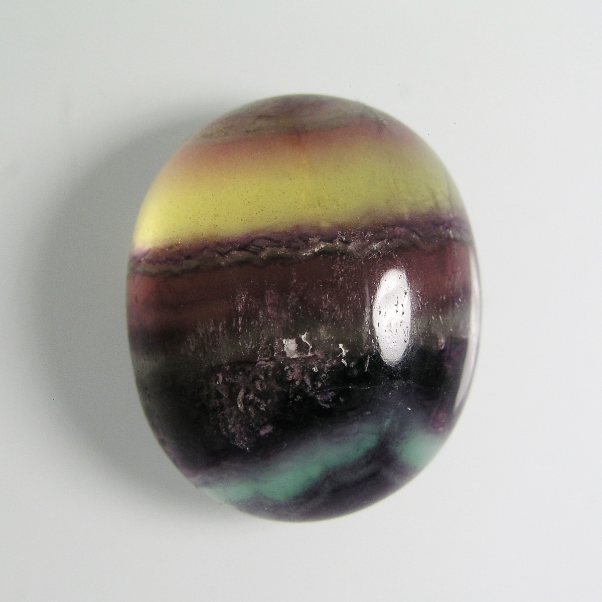 Minerál vícebarevný Fluorit, kabošon, 37,83 ct., 23,6x19,1x9,1 mm / od ...